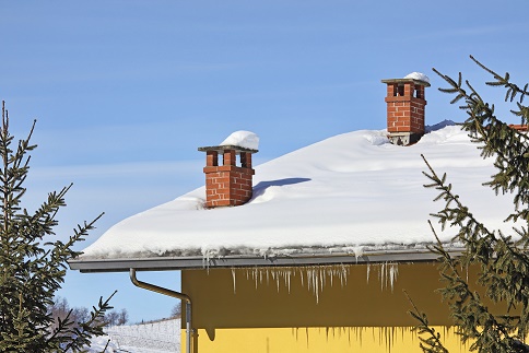 snowy-roof - Home Evolution Roofing