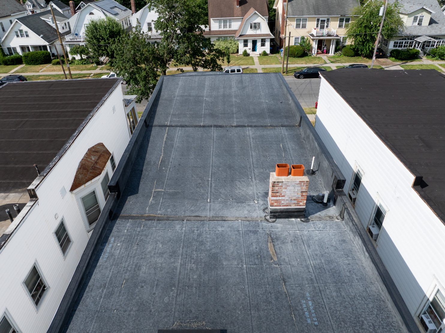 EPDM Installation for Albany, NY Commercial Buildings: Process and Benefits - Home Evolution Roofing